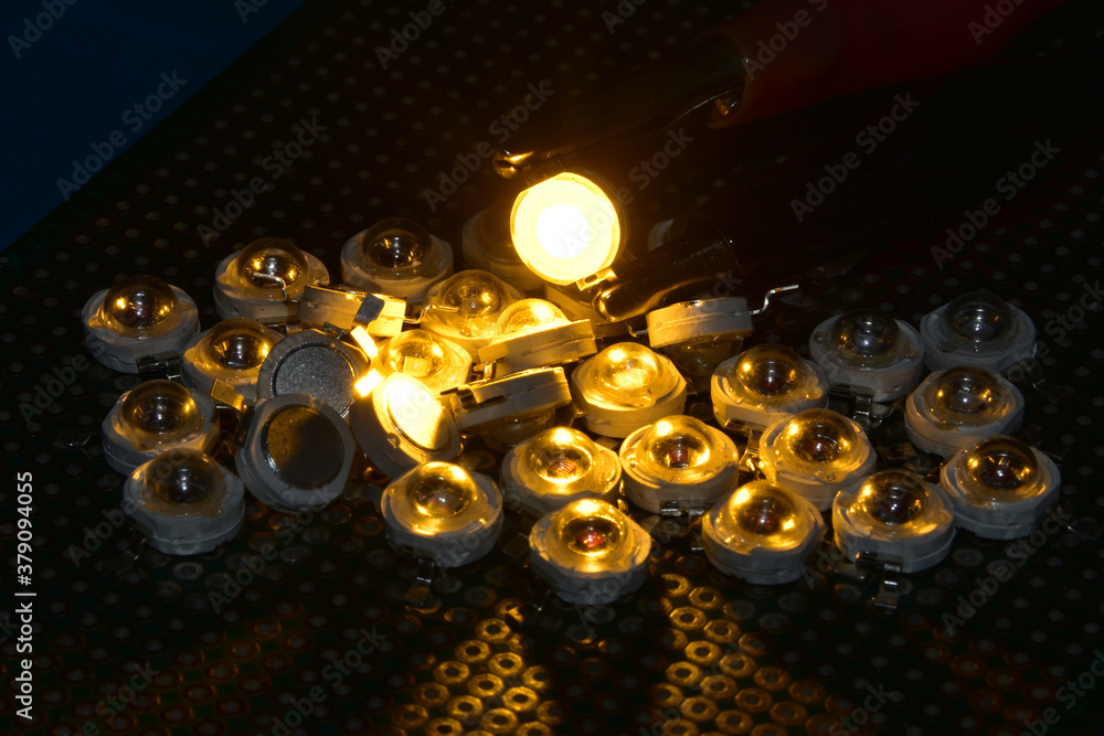 Semiconductor LEDs with yellow glow in a ceramic case with a metal heat ...