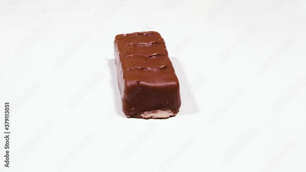 slicing snickers on isolated background. animation shows inside of ...