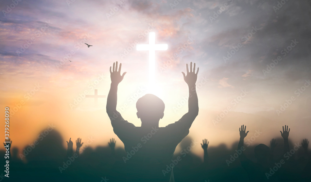 Worship concept: christian people Raise hand over cross on spiritual ...