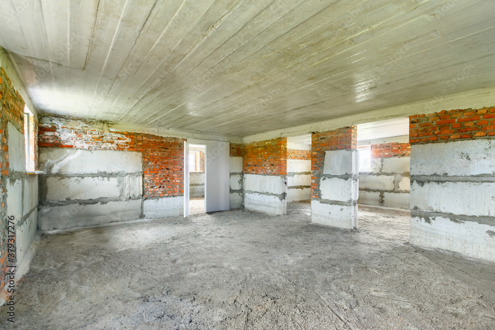 The corner view of the unfinished basement in a new residential house ...