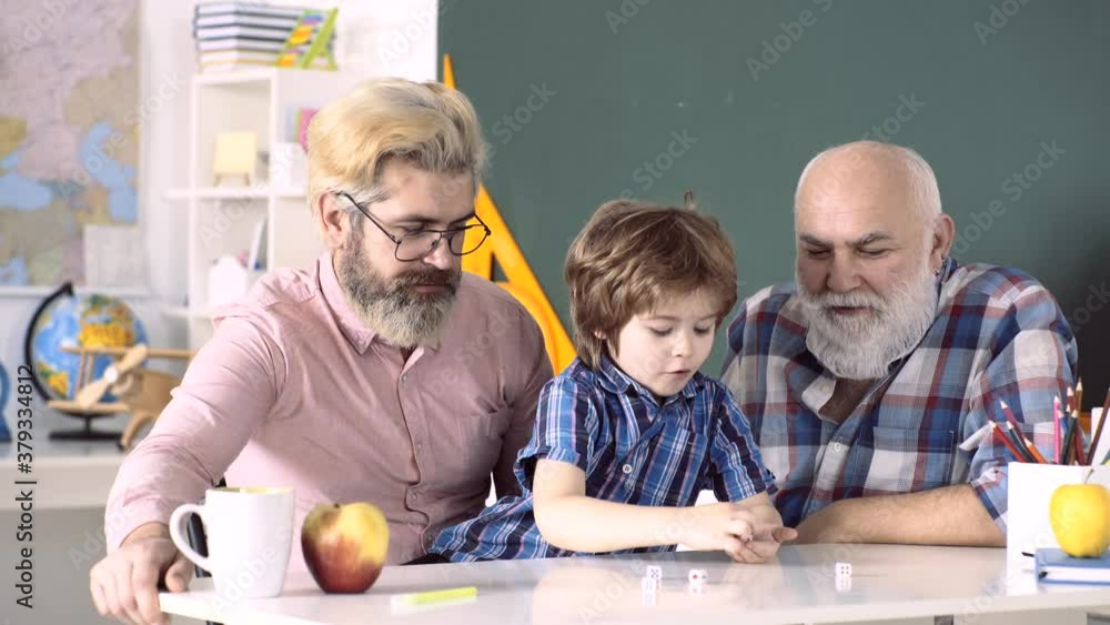 Father, Grandfather and son playing indoors. Generation of people and ...