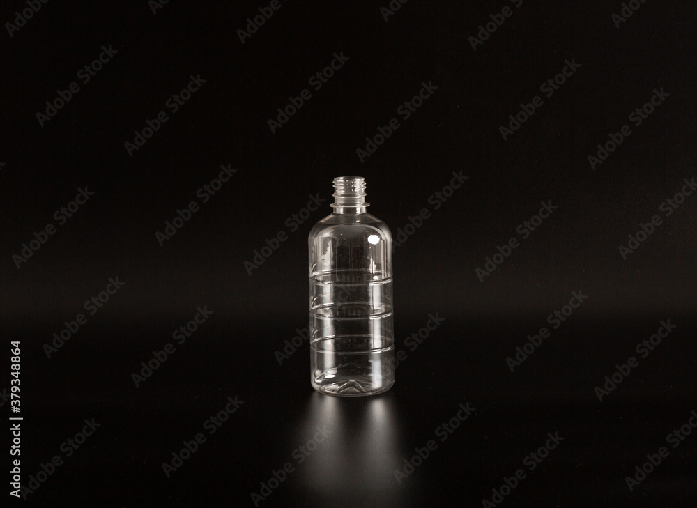 Clean white and transparent plastic container of different sizes on a ...