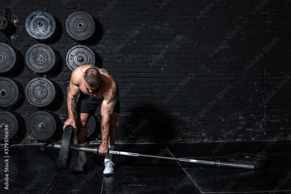 Photo & Art Print Young sweaty strong muscular fit man with big muscles ...