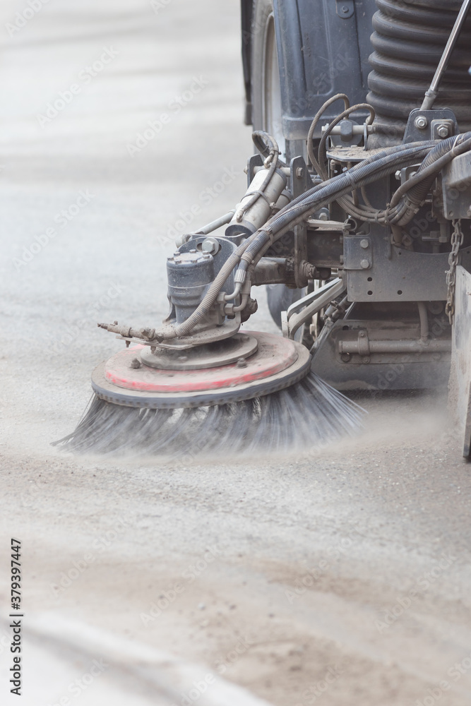 Machine clears the asphalt with a sweeper Stock Photo | Adobe Stock