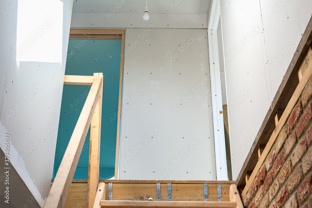 Stockfoto Steps leading to the loft space, unfinished loft extension ...
