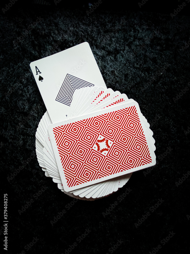 Playing card fan with a stylized ace of spades sticking out. Stock ...