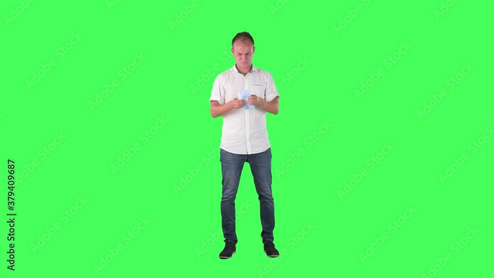 Frustrated business man ripping and tearing medical face mask with ...