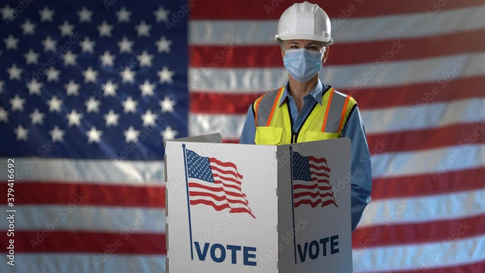 Conceptual portrait US flag background with smiling woman engineer ...