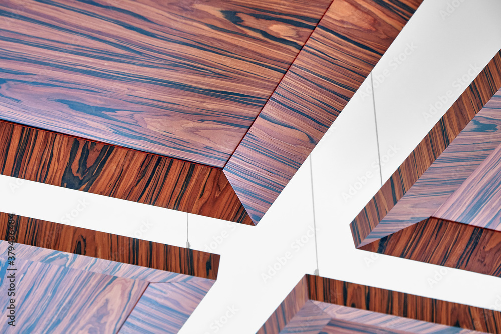 Wooden ceiling panels. Rosewood fineline veneer ceiling panels in the ...