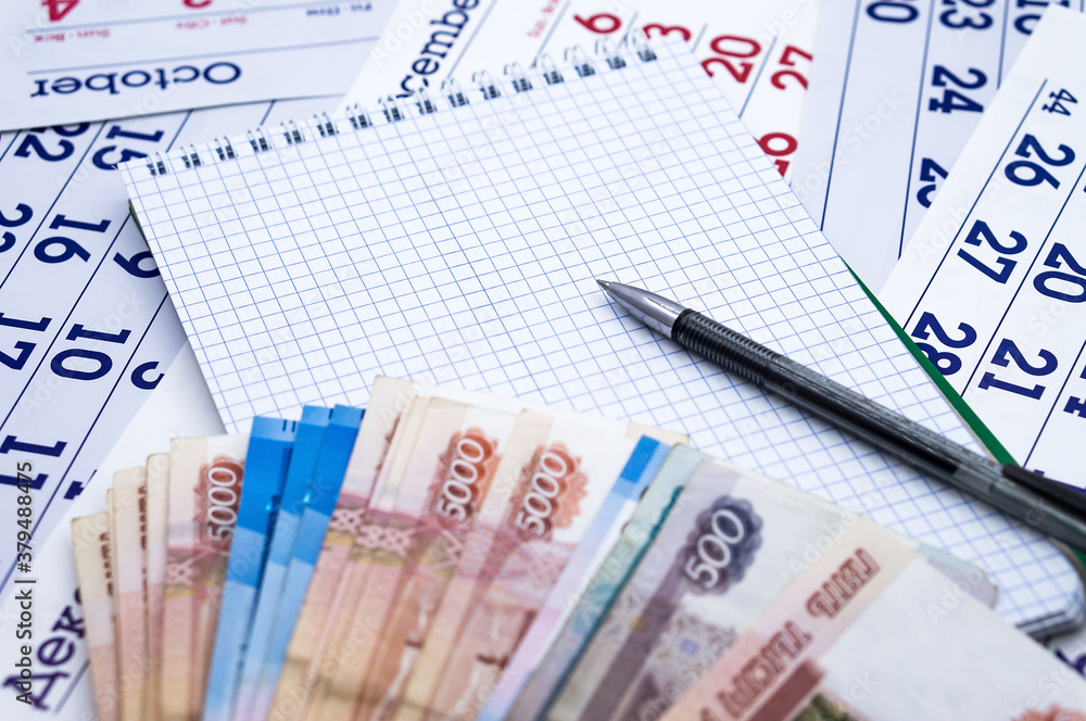 Russian money and a Notepad. A black pen and Russian banknotes. A clean ...