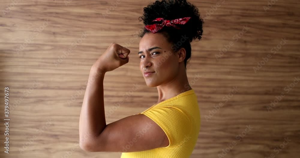 Strong young black woman showing muscle. We Can do it concept symbol ...