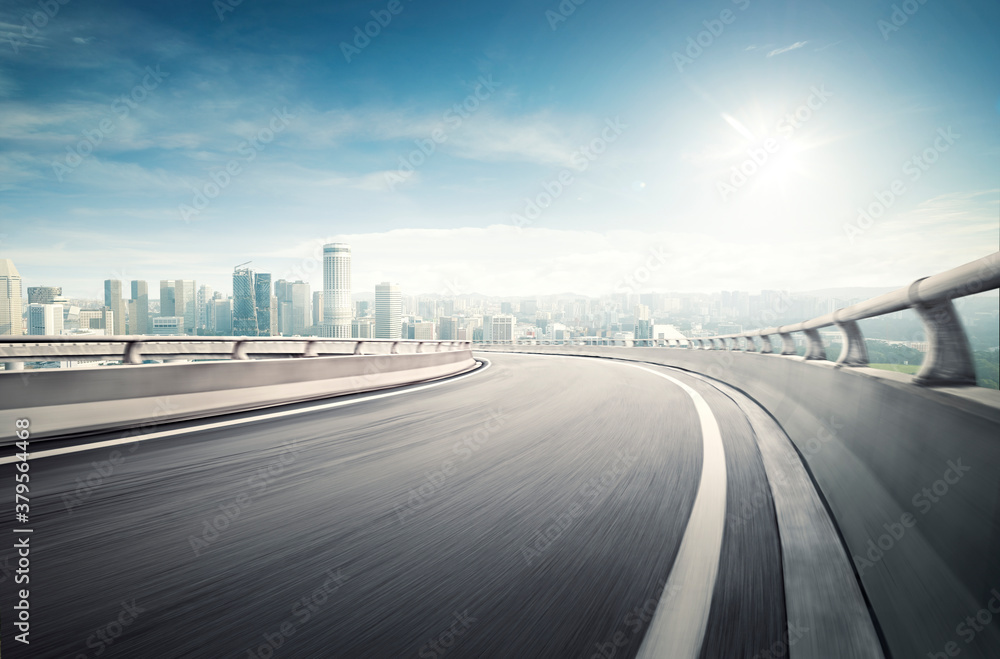 Photo Highway overpass motion blur effect with modern city background ...