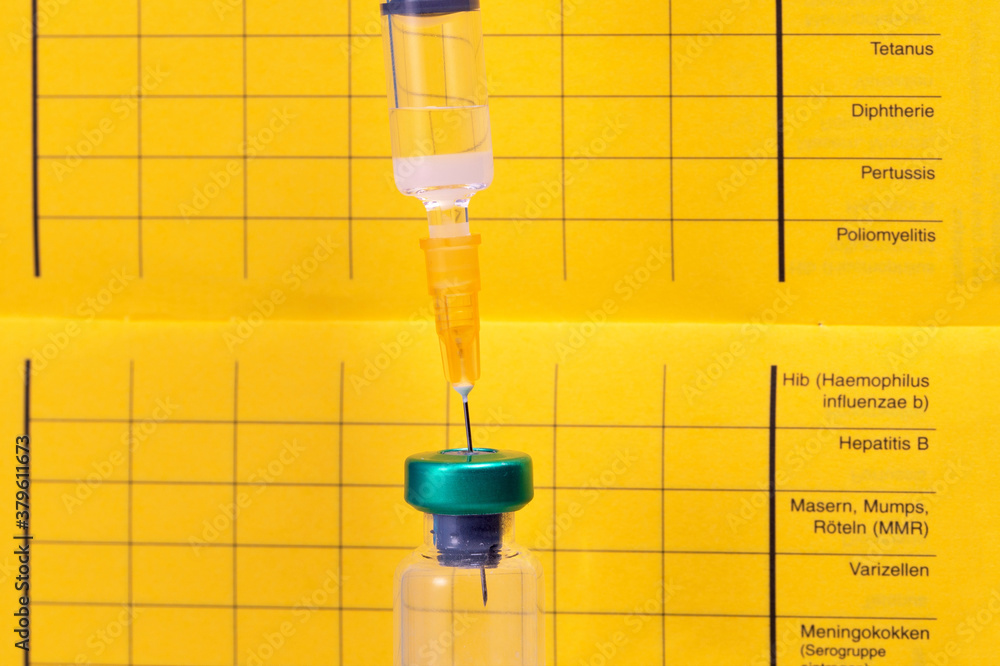Syringe and german Impfpass - immunization certificate - vaccination ...