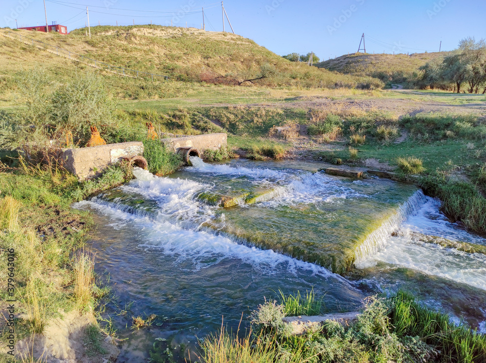 Water pressure in the river. Water flows by pressure and flows into the ...