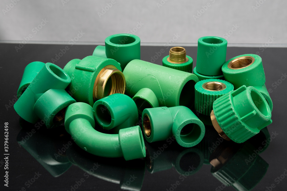 Plastic T-tube fittings on Black background, PVC Pipe connections, PVC ...