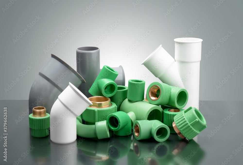 Plastic T-tube fittings on Black background, PVC Pipe connections, PVC ...