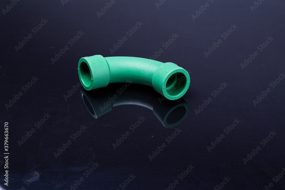 Plastic T-tube fittings on Black background, PVC Pipe connections, PVC ...