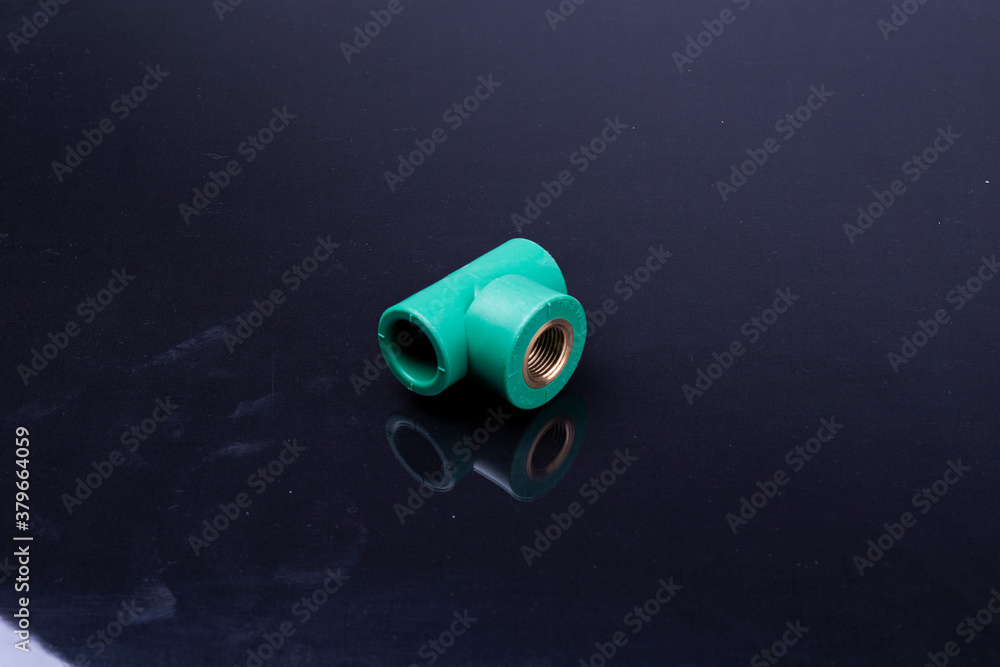 Plastic T-tube fittings on Black background, PVC Pipe connections, PVC ...