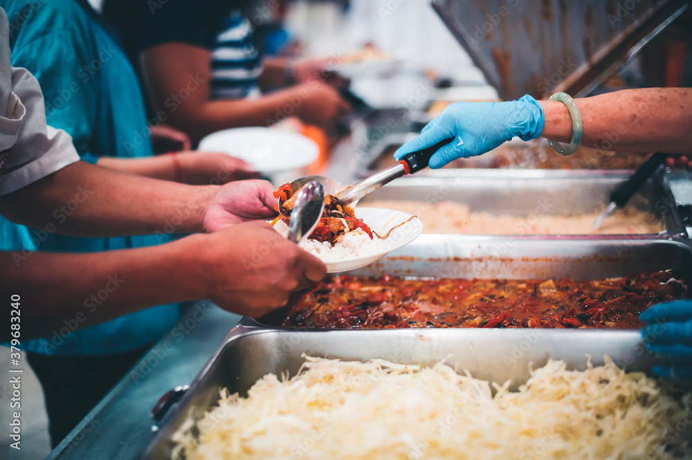 Receiving food for the poor from volunteers : Concepts of poverty Stock ...