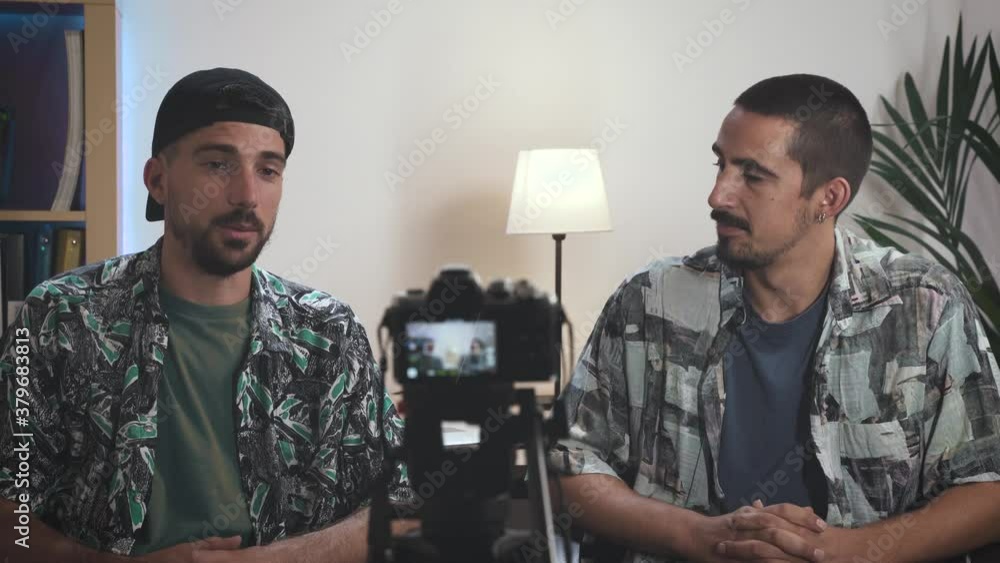 2 young man vlogger record interview video on camera for social media ...