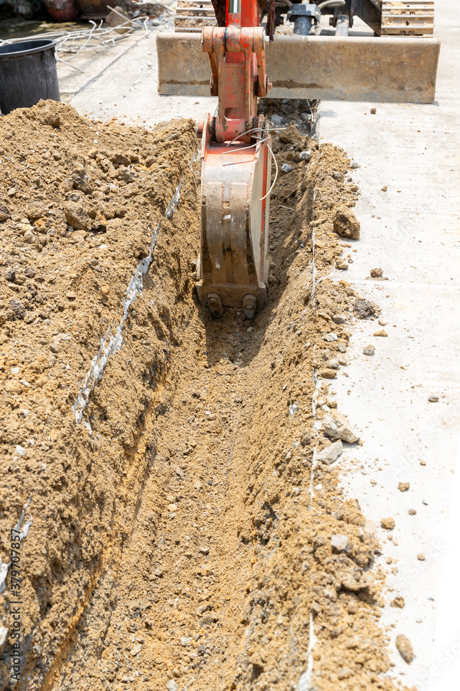 Digging road before install Pipe Water. Excavation water drainage at ...