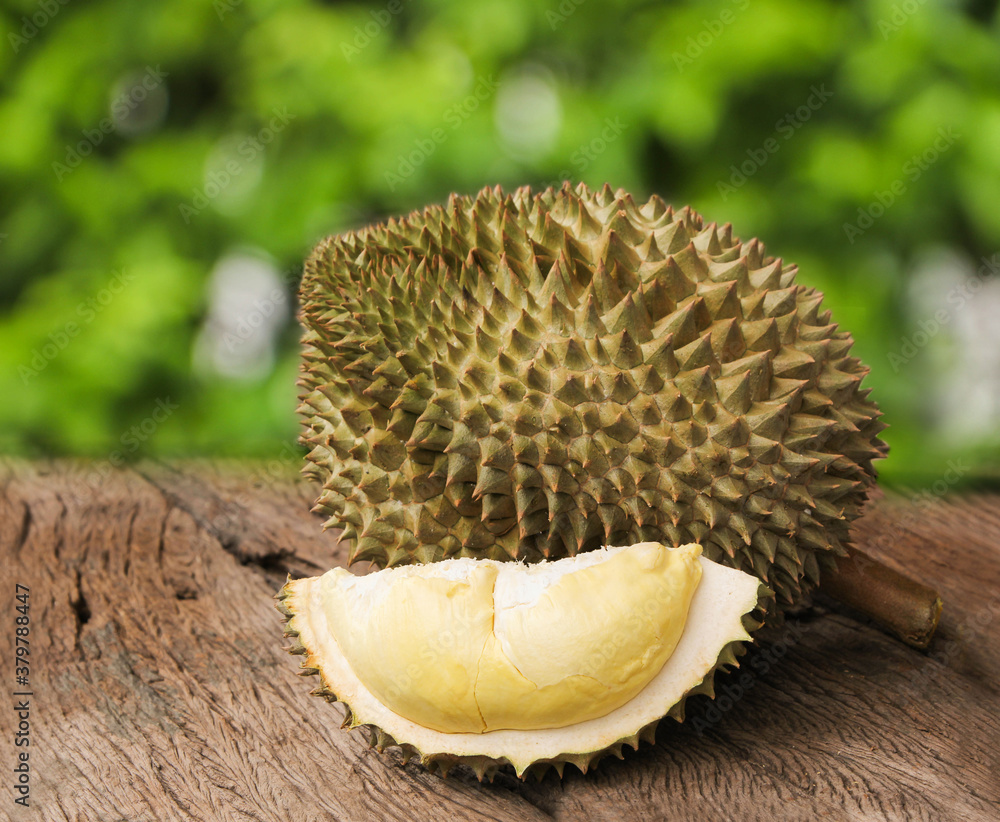 Durian riped and fresh, Durian peel with yellow color on old wood ...