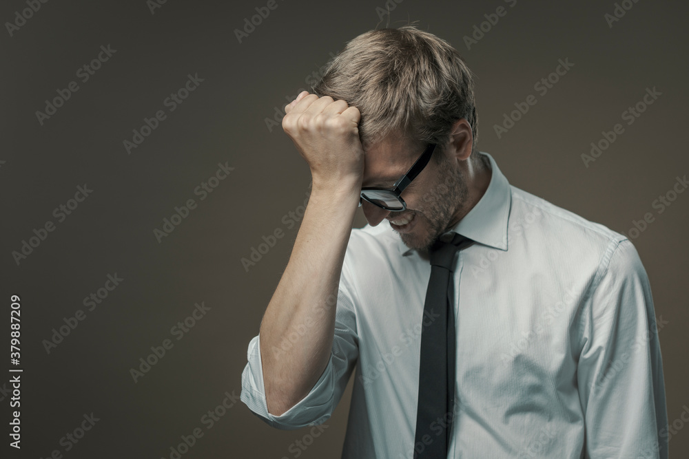 Stressed frustrated businessman making a facepalm gesture Stock Photo ... Stressed frustrated businessman making a facepalm gesture Stock Photo ...