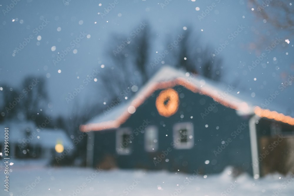 Snow falling outside of a suburban home at christmas Stock Photo ...
