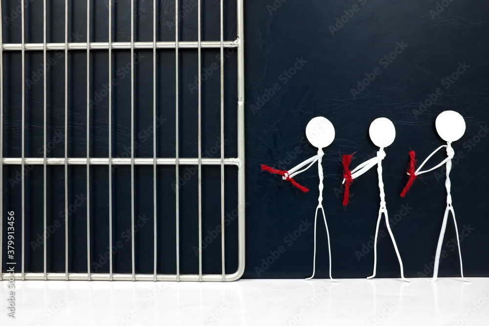 Stick man figure handcuffed tied with red rope going to a jail prison ...