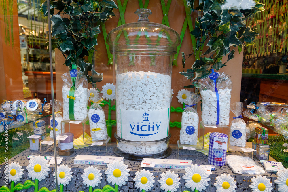Vichy lozenges with logo and sign for shop candy in a specialised store ...