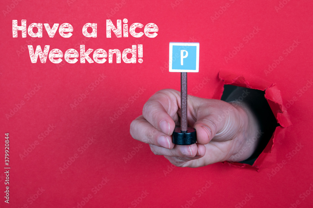 Have a Nice Weekend. Parking road sign in a woman's hand Stock Photo ...