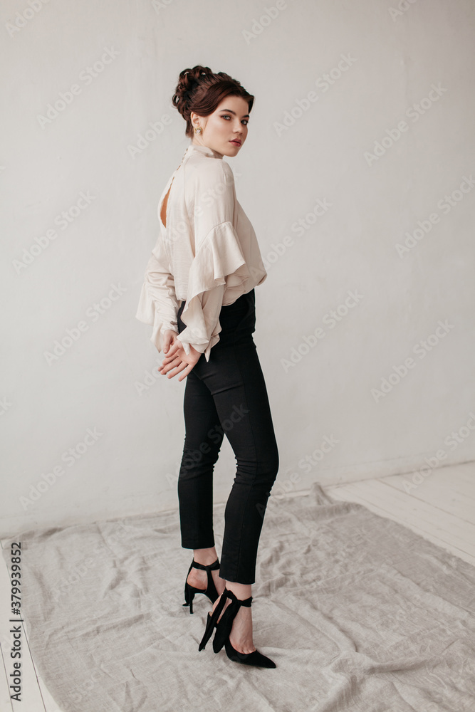 Full length portrait of beautiful female posing in studio Stock Photo ...