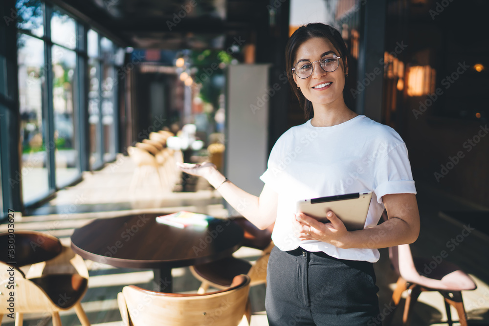 Half length portrait of smiling beautiful woman administrative ...