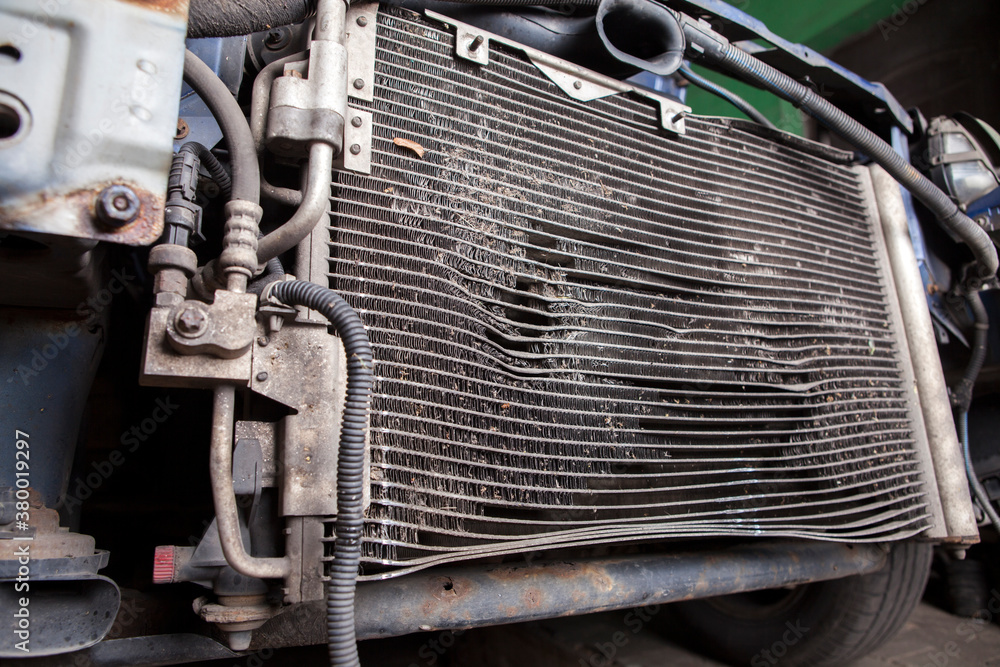 It's time to replace a corroded car radiator. Removing the radiator ...