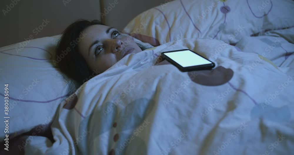 Sad lonely woman ignores calls. A pensive woman, with an apathetic look ...