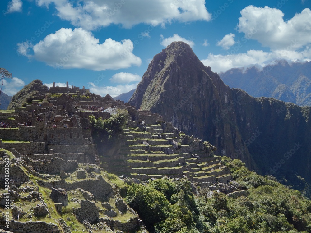 A view of Machu Picchu and Inca valley ruins in Peru which is a famous ...