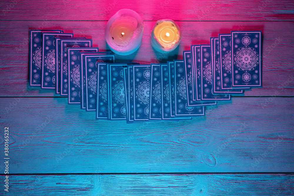 Tarot cards deck on the fortune teller desk table background. Future ...