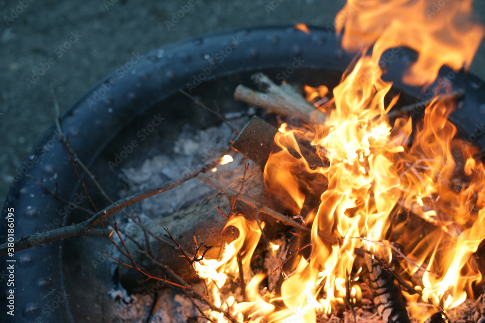 Flames In A Backyard Fire Pit Stock Photo | Adobe Stock