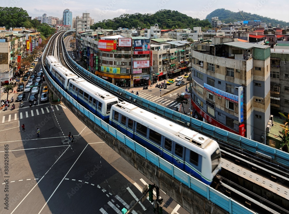 Scenery of a train traveling on the elevated rail of Taipei Metro ...
