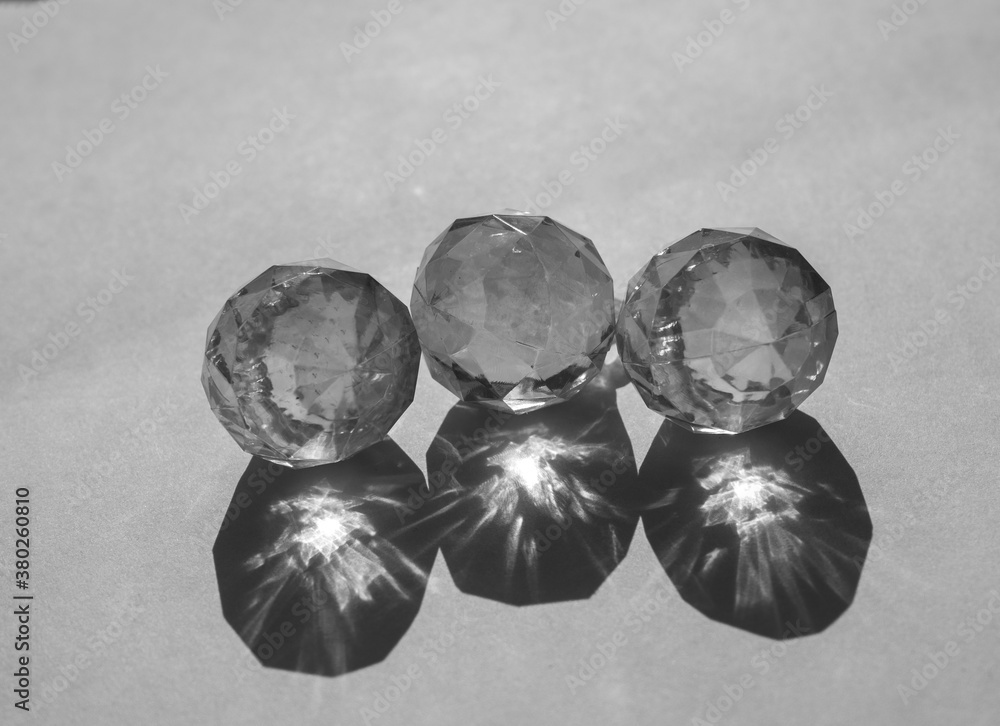 Refraction and reflection of light casts shade and shadow on white ...