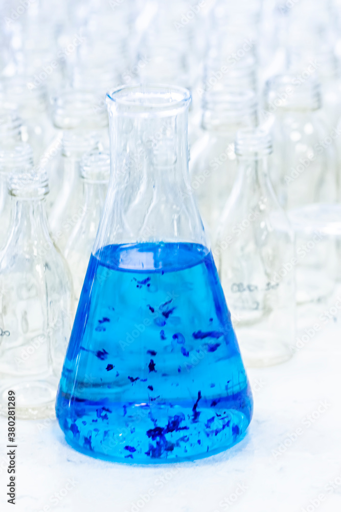 blue solution (methylene blue) in erlenmeyer, experiments in chemistry ...