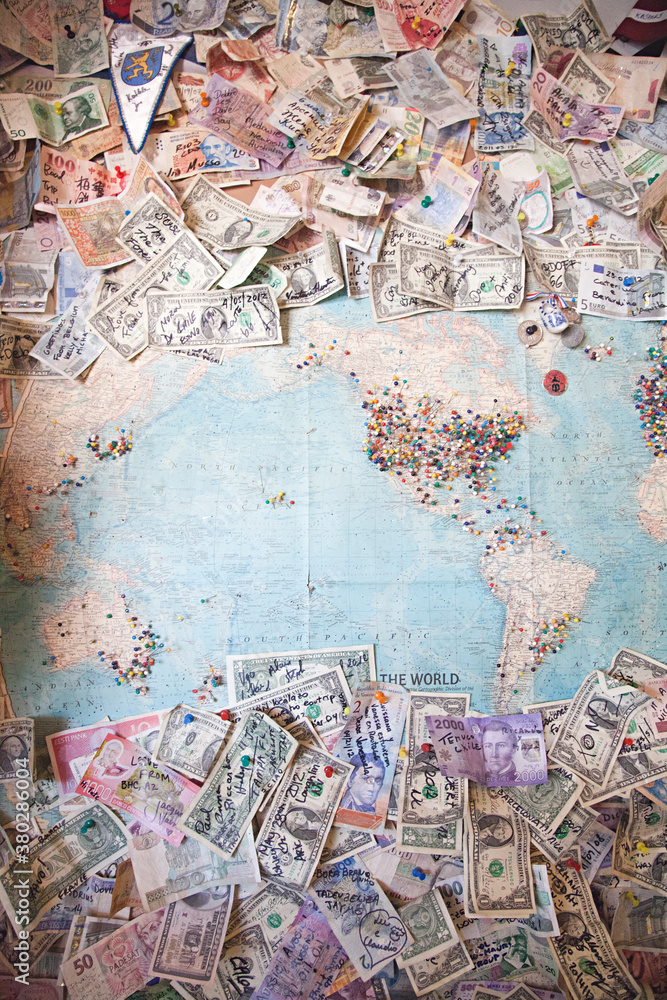 world map with pins and money from visitors around the world Stock ...