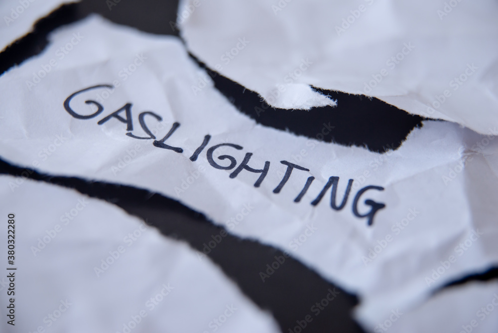 Word Gaslighting, written on white torn paper, with black ink Stock ...