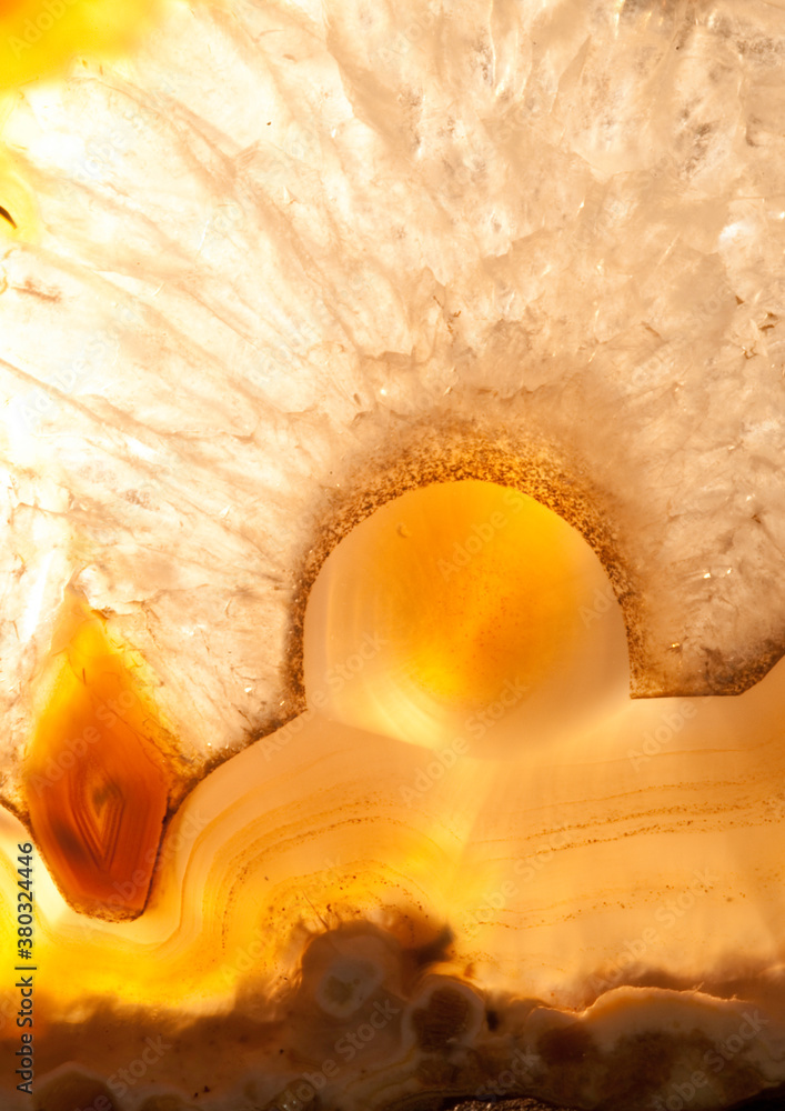 Macro closeup of the patterns of color and texture in a geode rock ...
