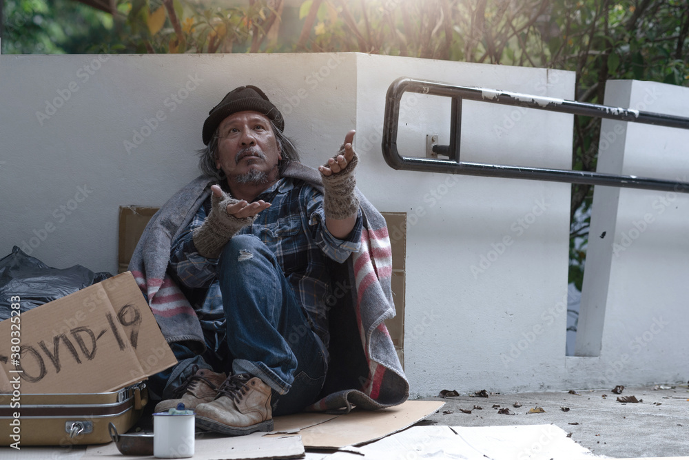 Homeless man or beggars with sad face asked to donate food or money ...