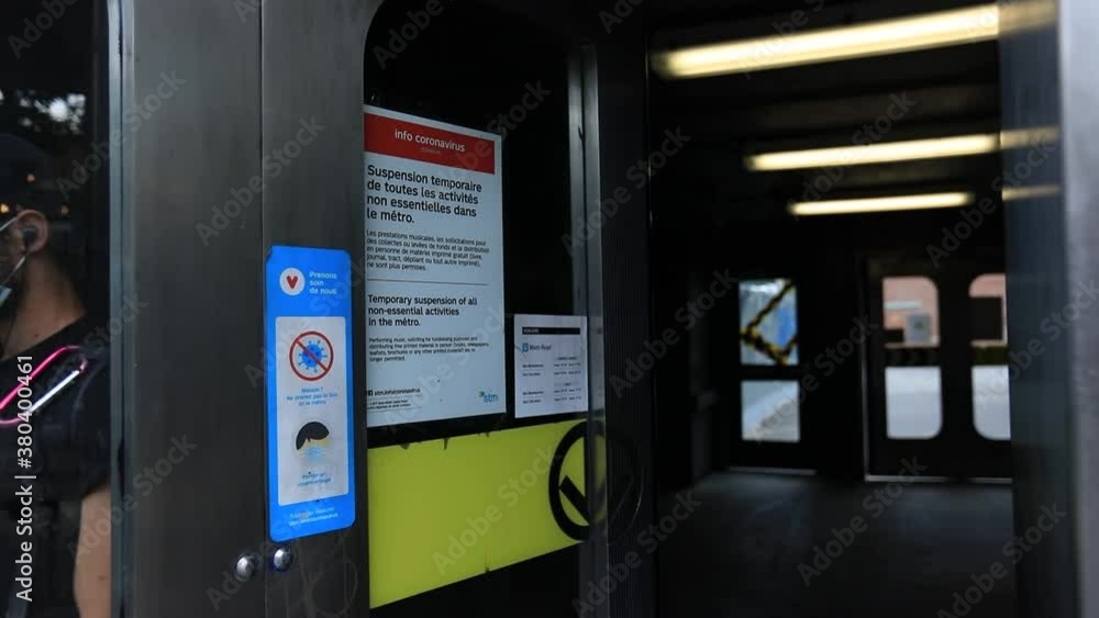 Selective focus of poster notice stuck on entrance gate of metro subway ...
