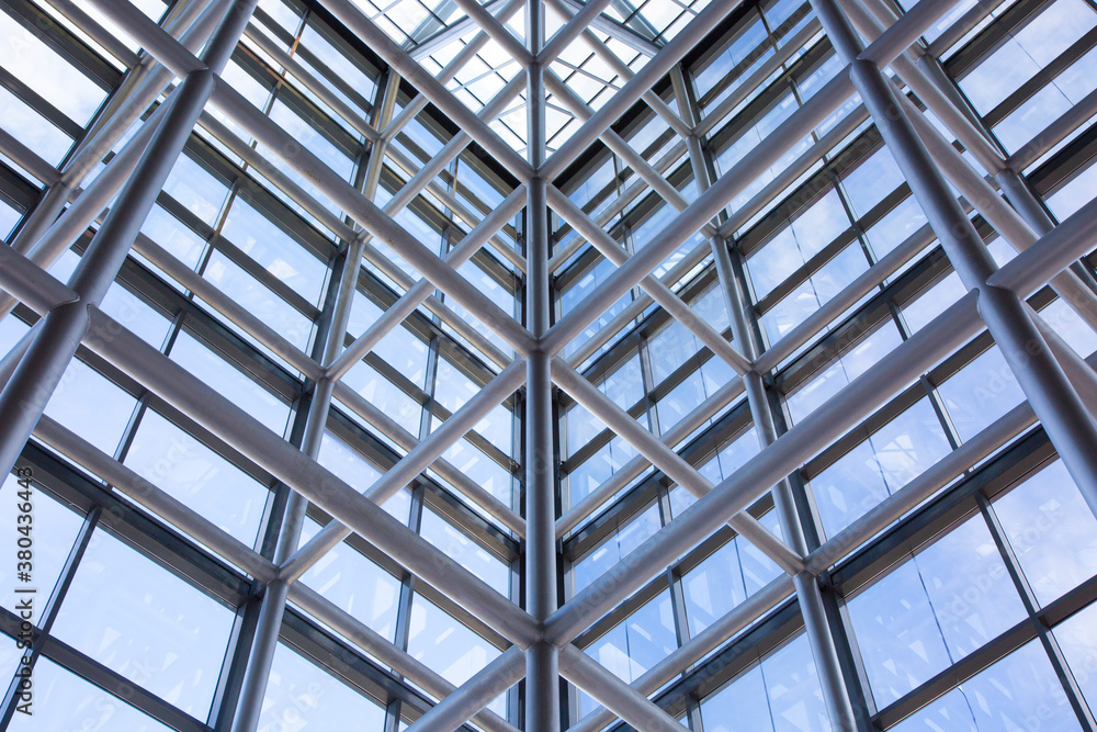Symmetrical construction of metal pipes Stock Photo | Adobe Stock