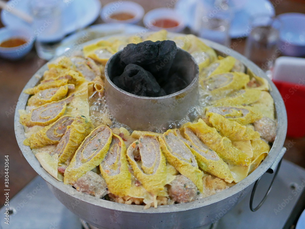 Big cooking hot pot with hot charcoals in the middle, originally from ...