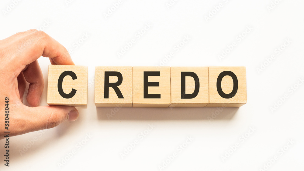 Word credo. Wooden small cubes with letters isolated on white ...