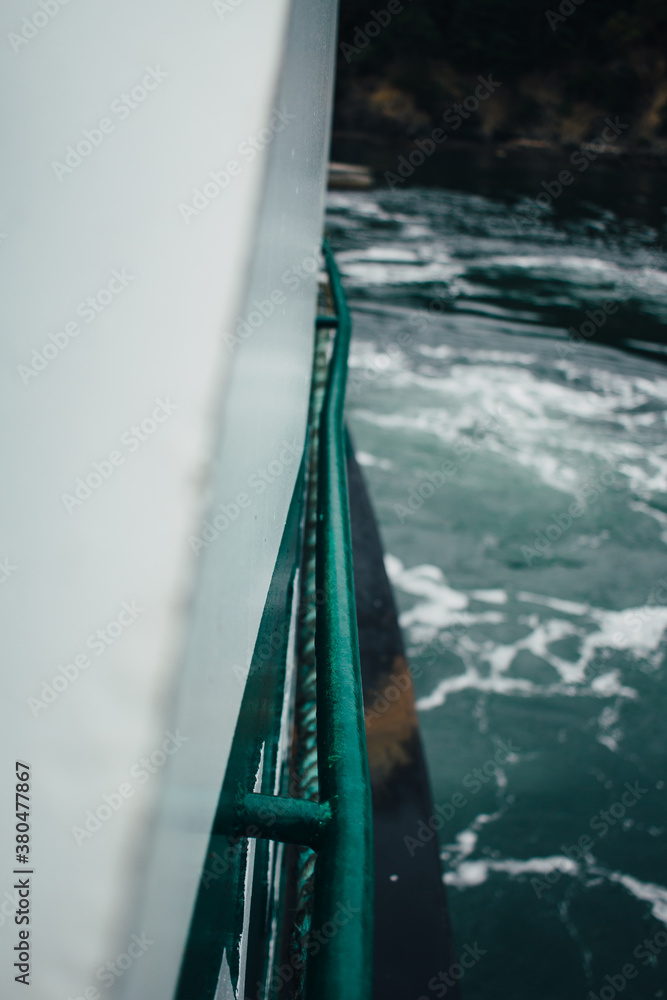 Rail On Side Of Ferry Boat On Ocean Water Stock Photo | Adobe Stock